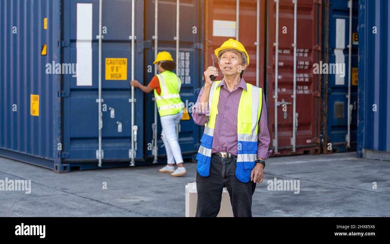 Old Manager with labtop computer inspector or Safety Supervisor in ...