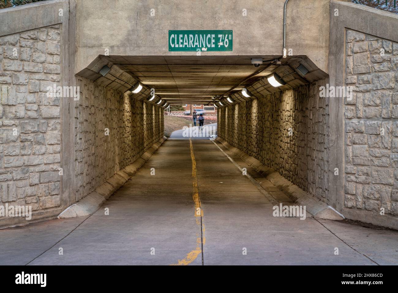 bike trail goes through underpass tunnel - part of extensive trail ...