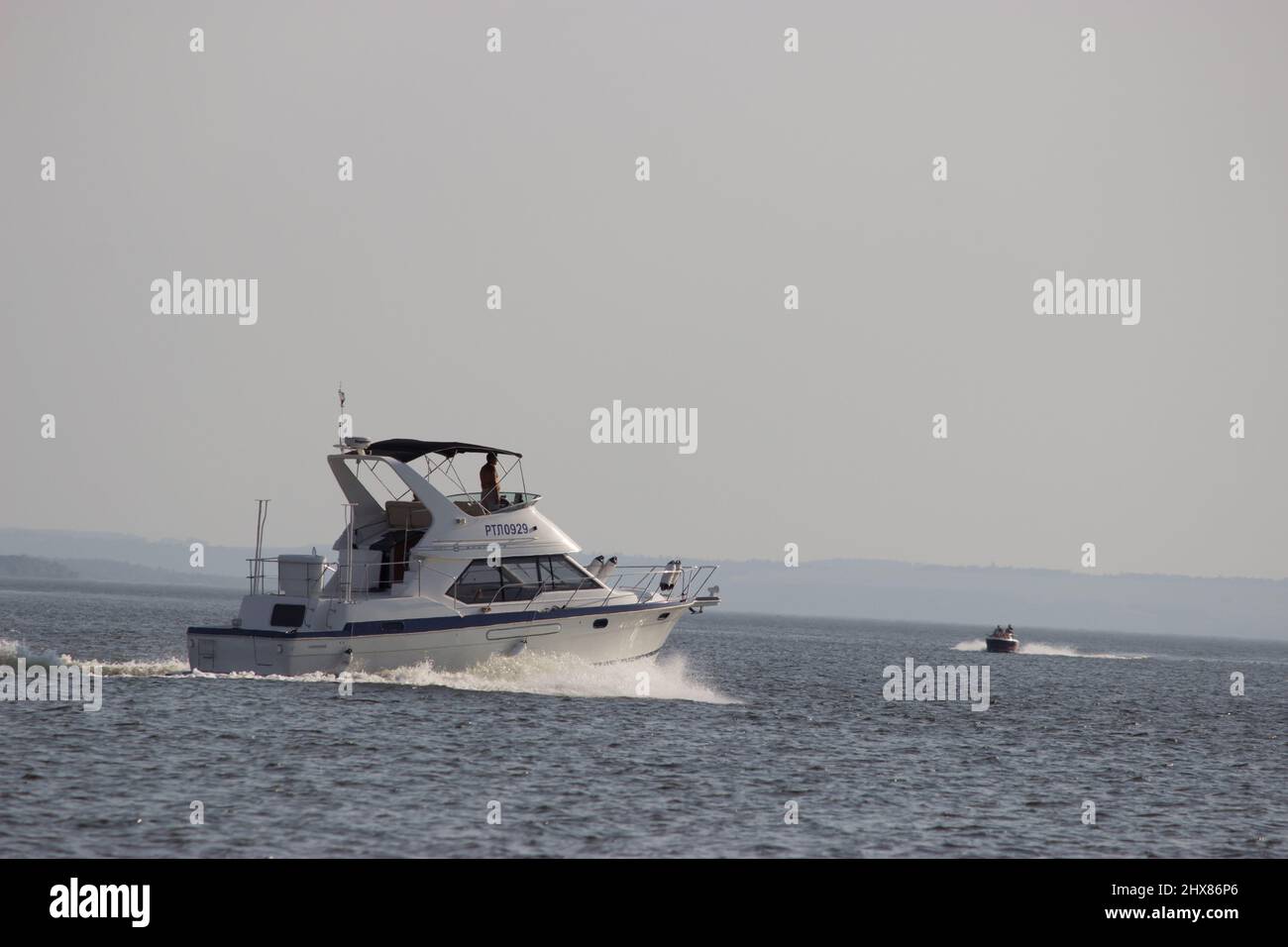 Speed boat on the water going fast. Copy space Stock Photo - Alamy