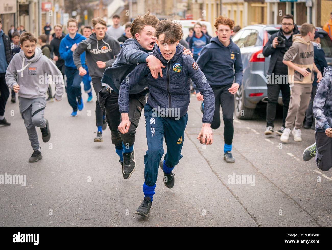 Boys tussle for the leather ball during the annual Jedburgh ba' game ...