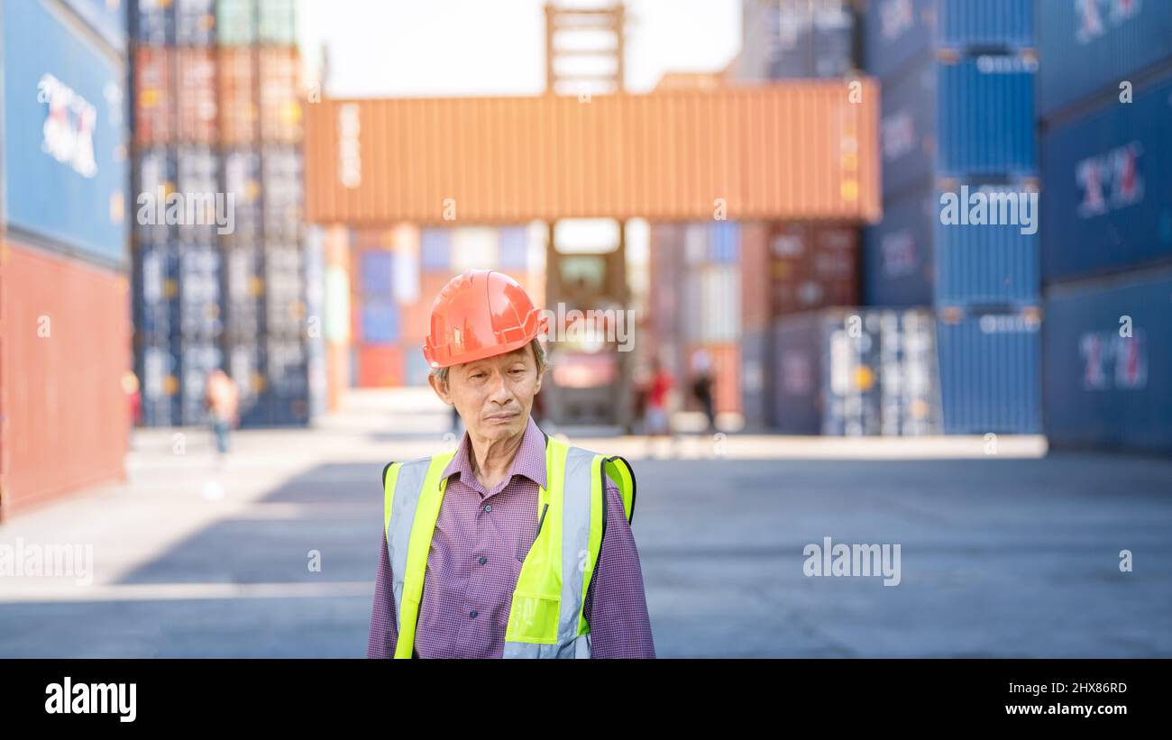 Old Manager with labtop computer inspector or Safety Supervisor in ...