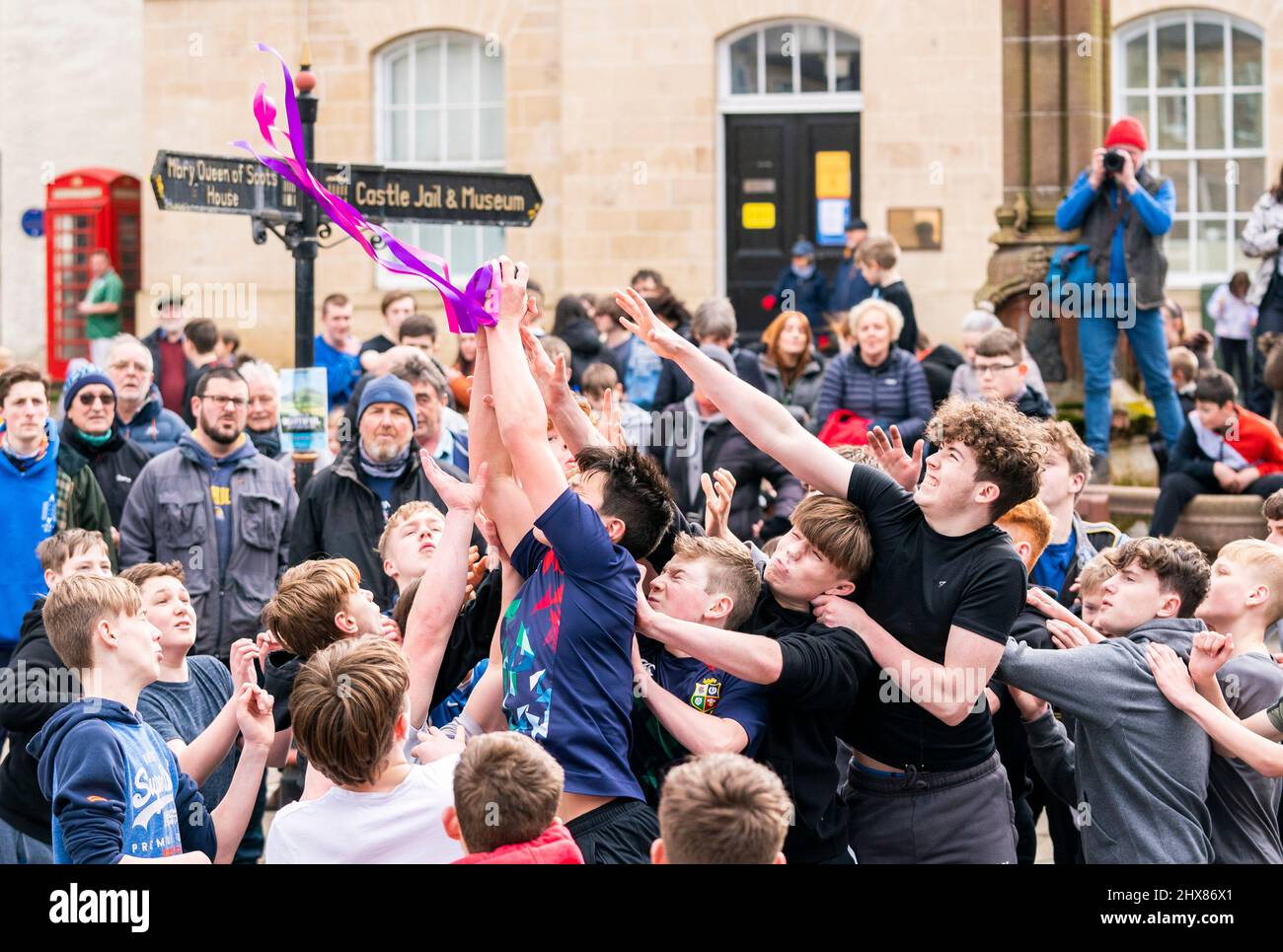 Boys tussle for the leather ball during the annual Jedburgh ba' game ...