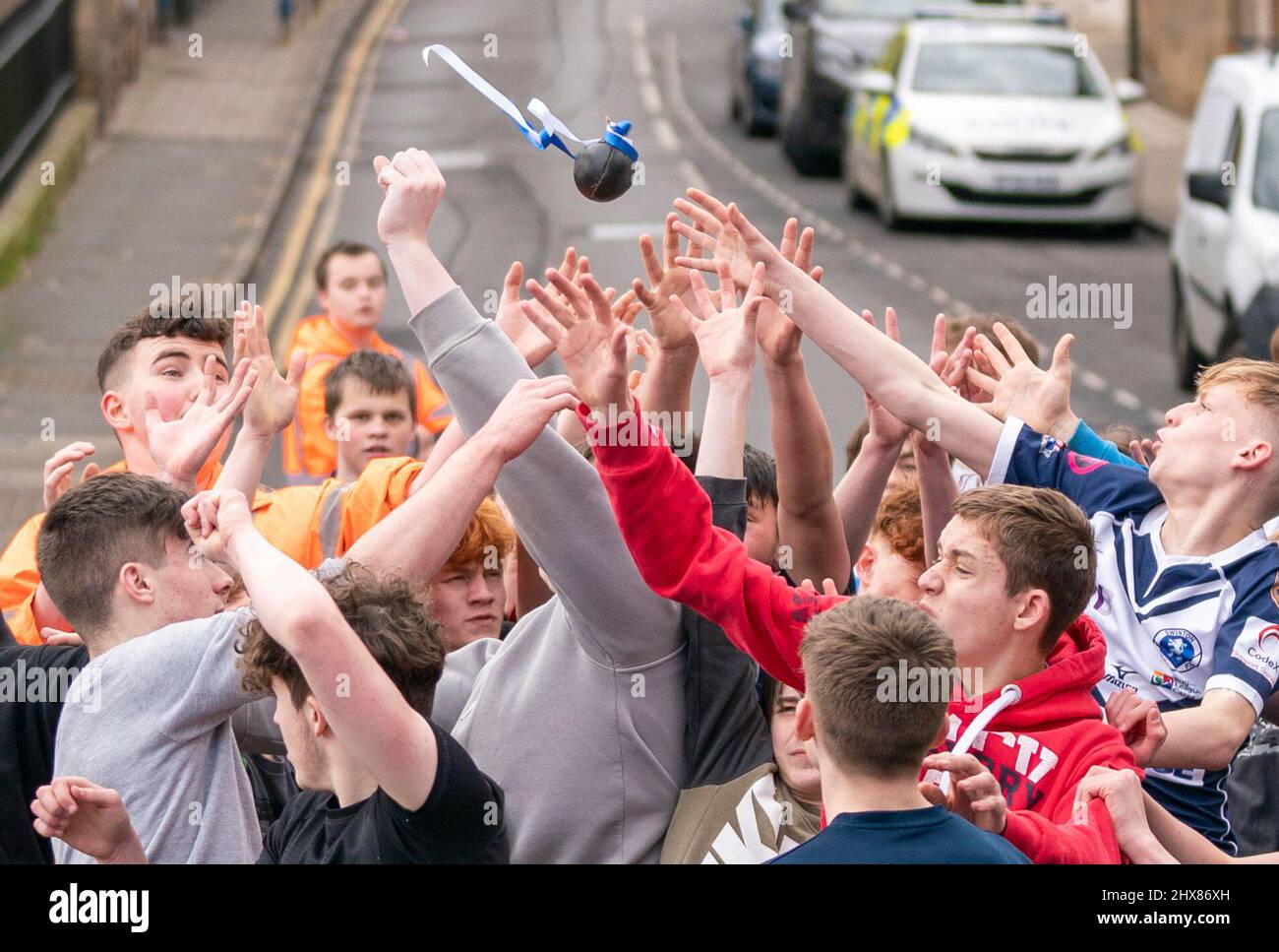 Boys tussle for the leather ball during the annual Jedburgh ba' game ...