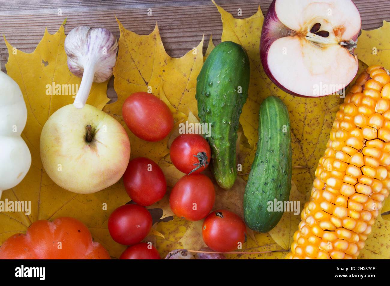 Vegetable on the table with autumn leaves. Harvest Stock Photo - Alamy