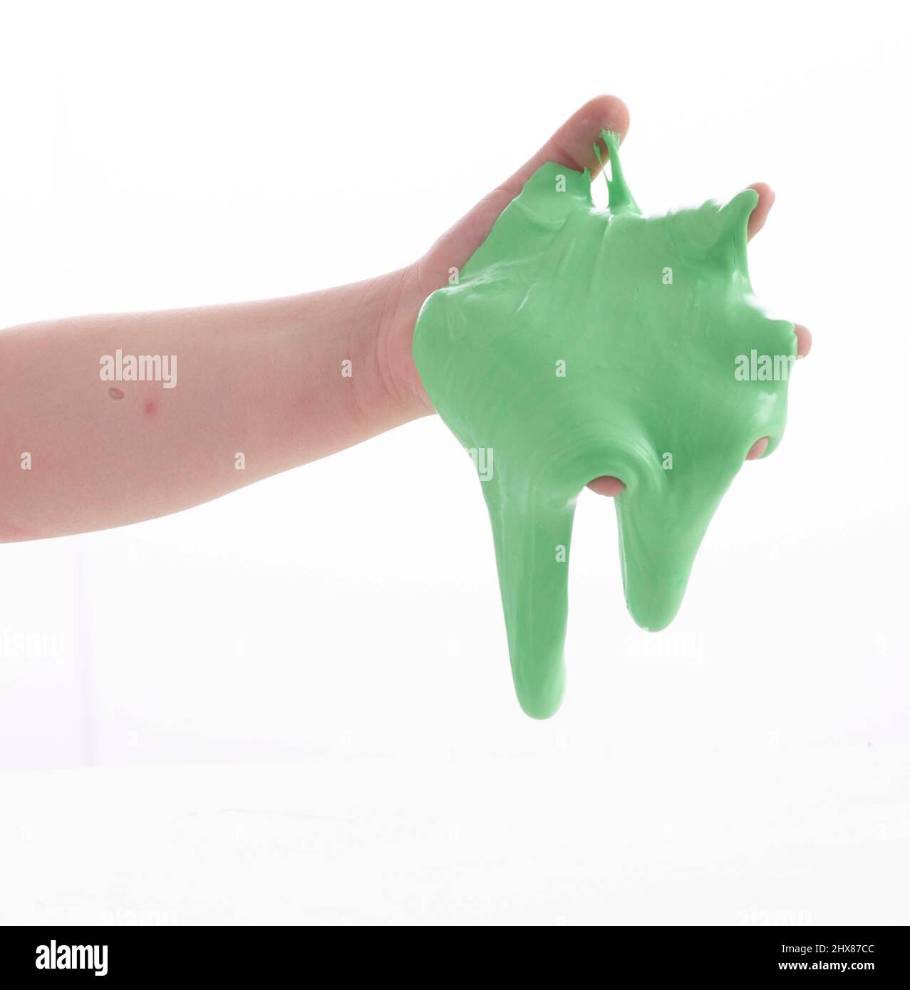 Green slime toy background hi-res stock photography and images - Alamy