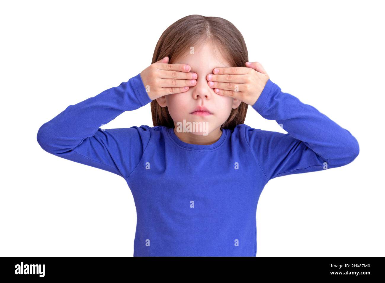 Child closing eyes by hands, isolated on white background waist up ...