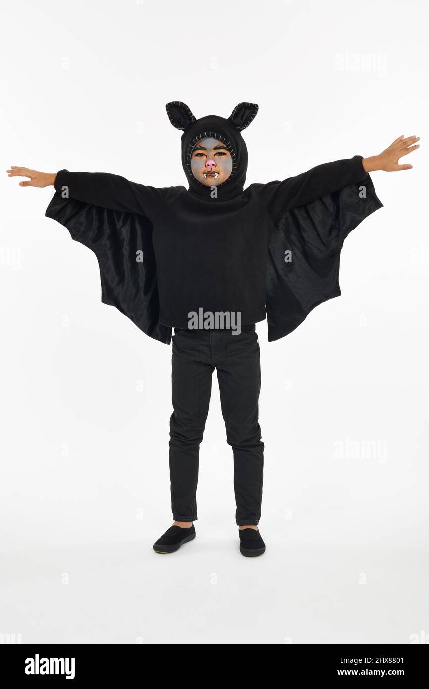 Kid/Model dressed as a bat for Halloween Stock Photo - Alamy