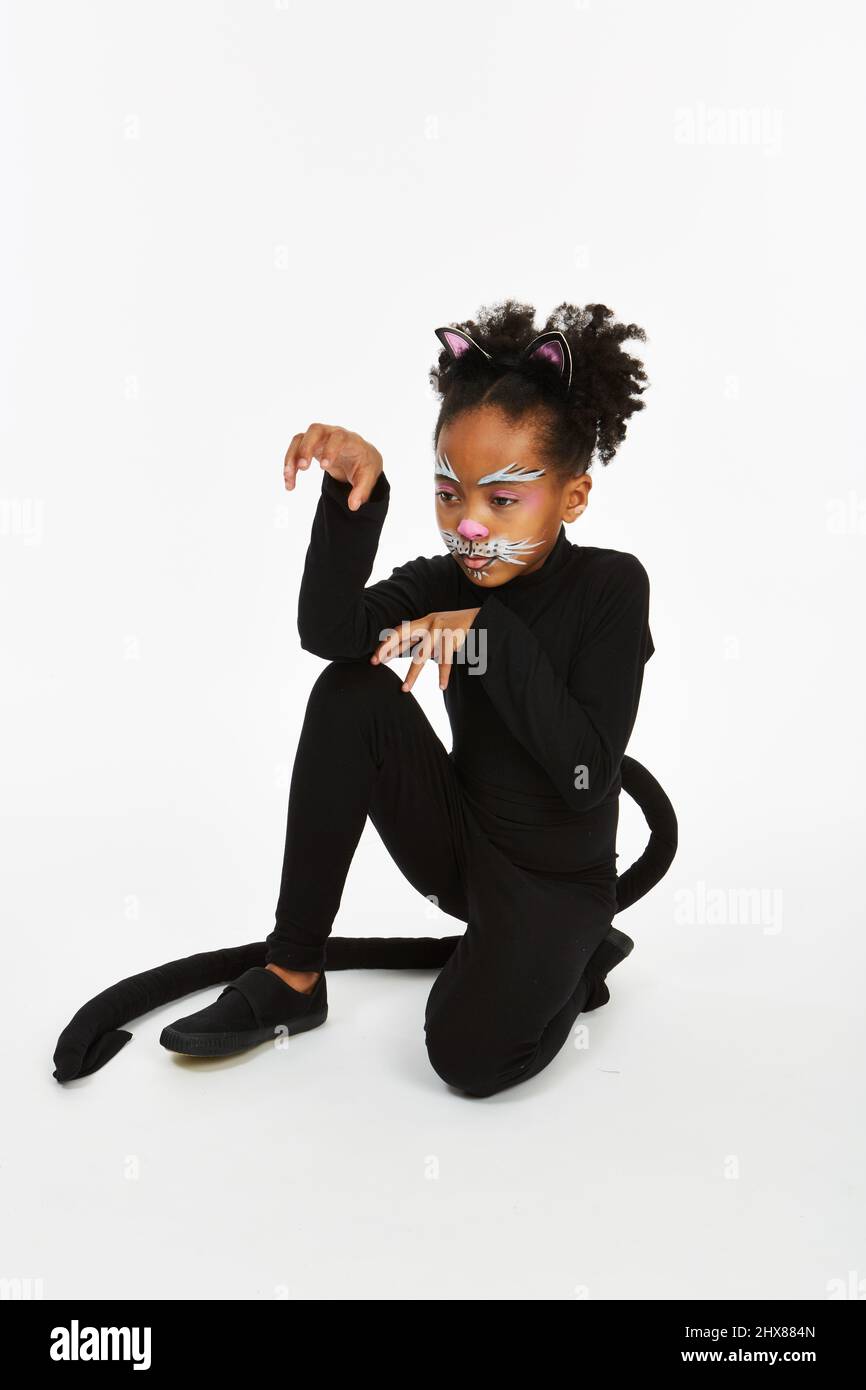 Kid/Model dressed as black cat Stock Photo - Alamy