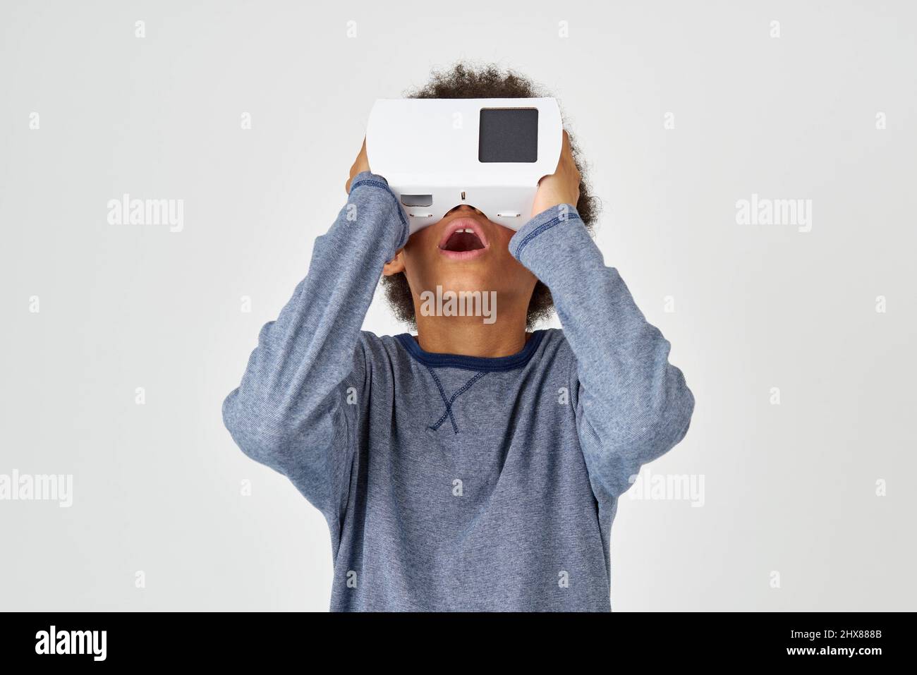 Boy with curly hair and white shirt hi-res stock photography and images ...