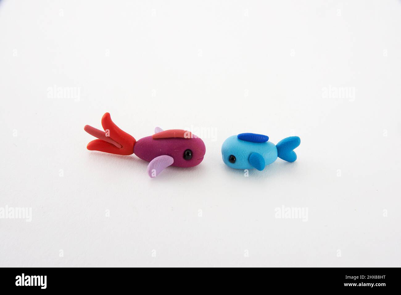 Red toy fish hi-res stock photography and images - Alamy