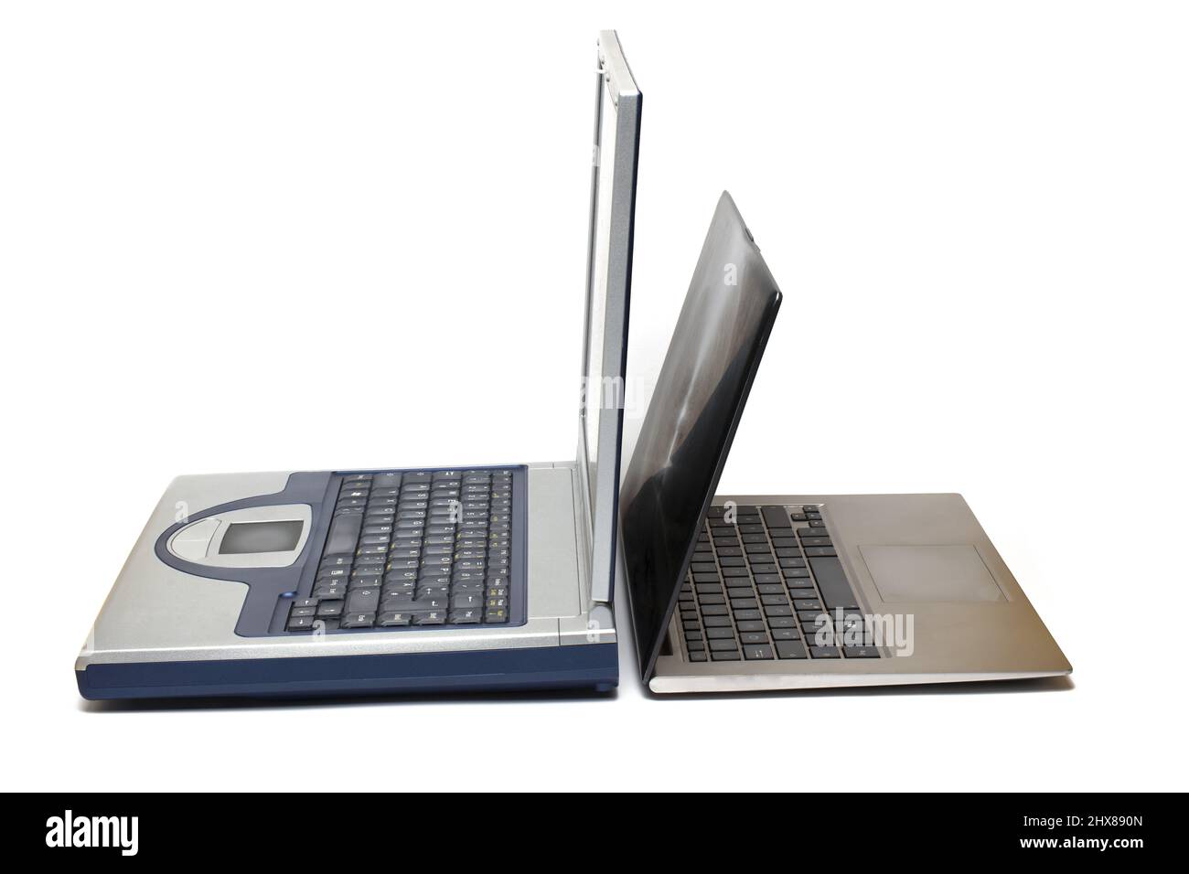 Close up of side by side open notebooks of different generations from ...