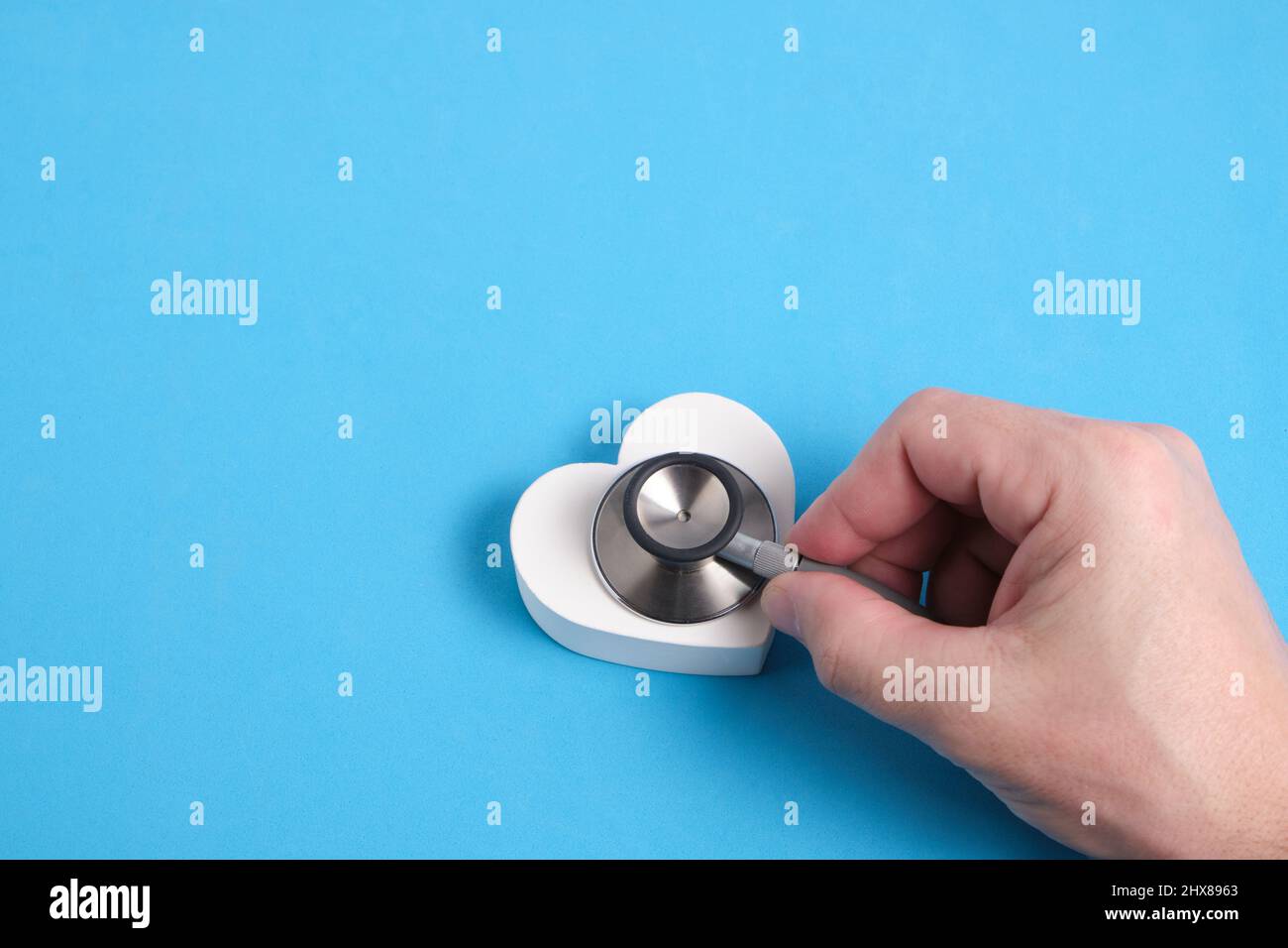 In hand stethoscope, listening heart.Medical examination heart Stock ...