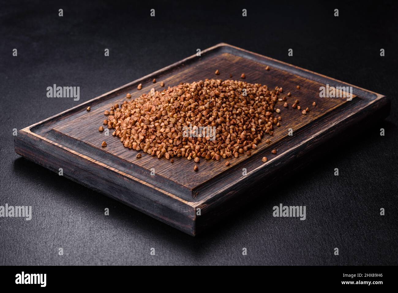 Bio buckwheat cereals raw food background, texture close up. The ...
