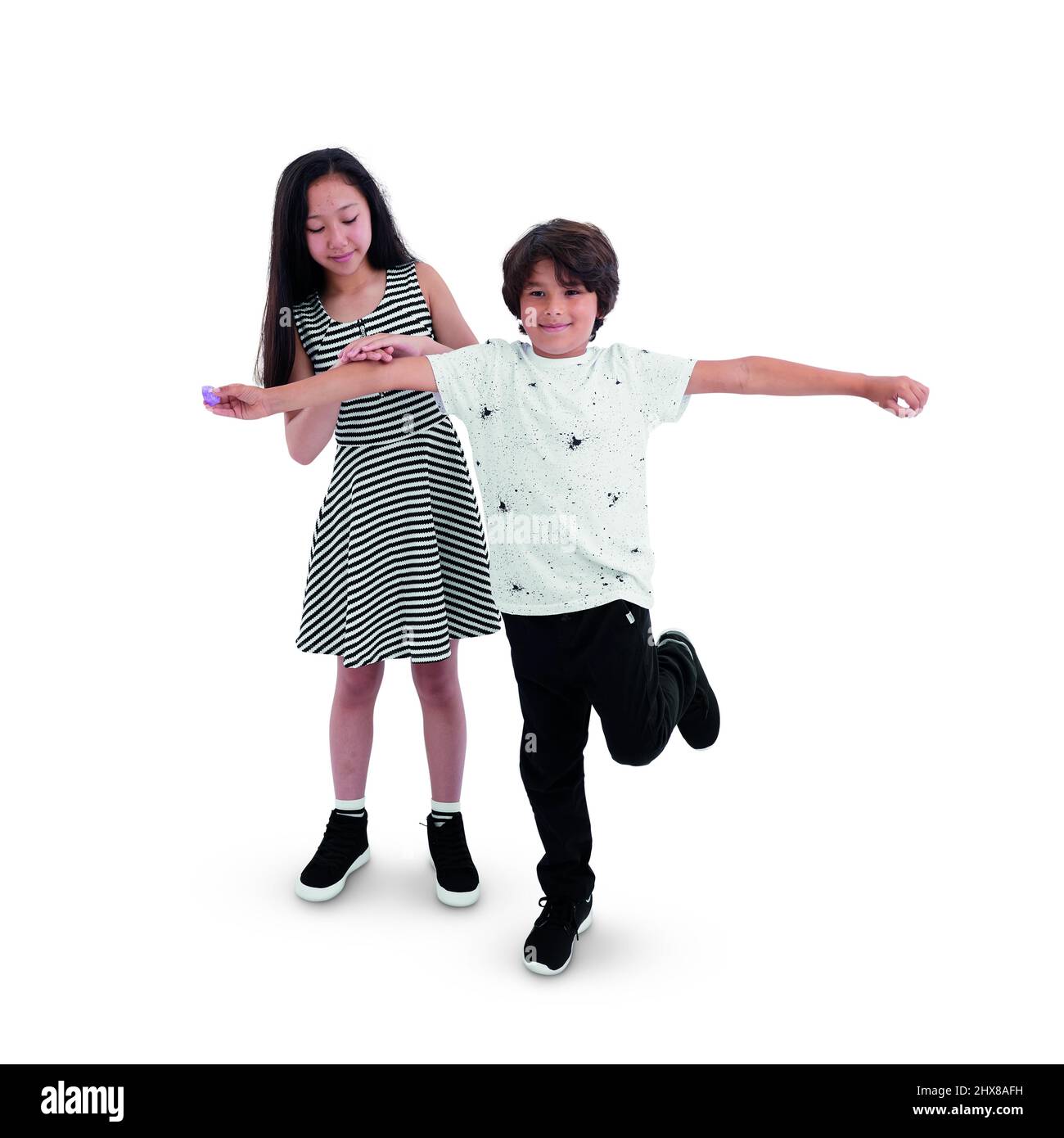 Child balancing one leg Cut Out Stock Images & Pictures - Alamy