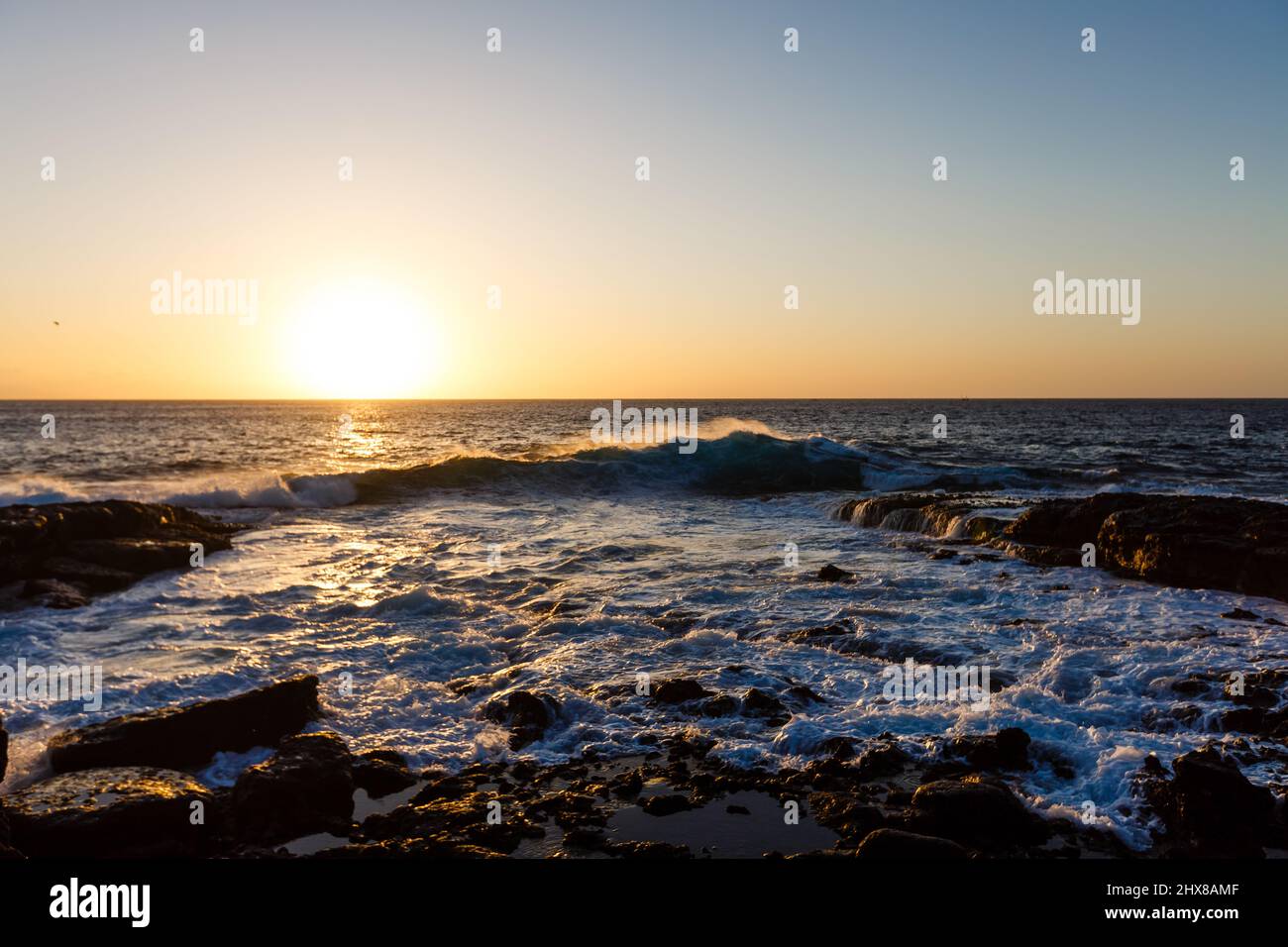 quiet sea coast with stones at the twilight, natural sea background ...