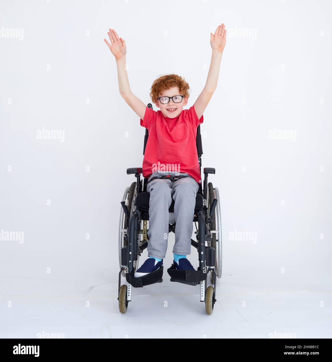 Boy in V for Victory Pose Stock Photo - Alamy