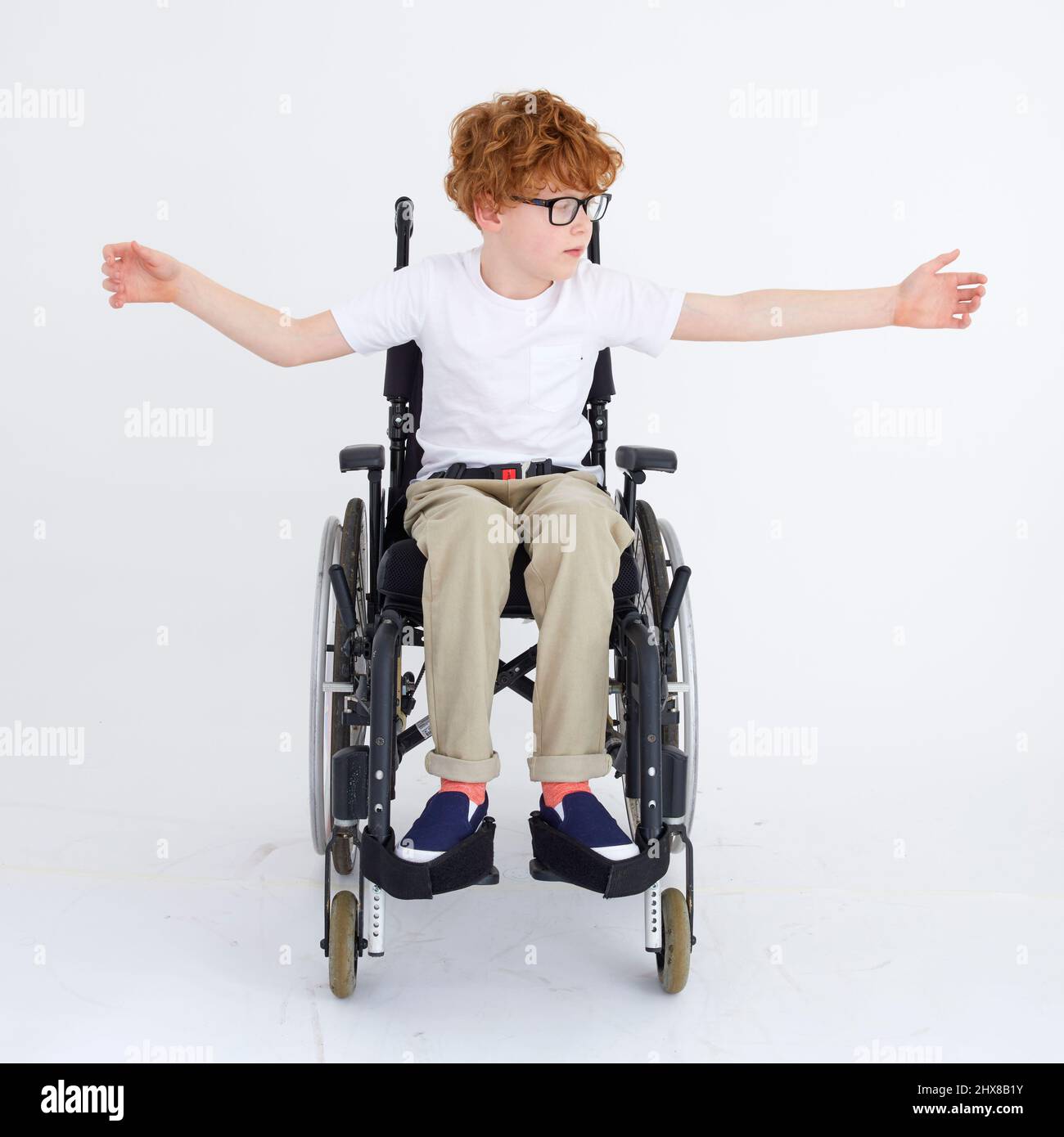 A young boy in Growing Gratitude Pose Stock Photo - Alamy