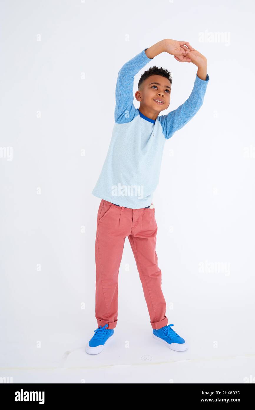 Boy in Press and Circle Pose Stock Photo - Alamy