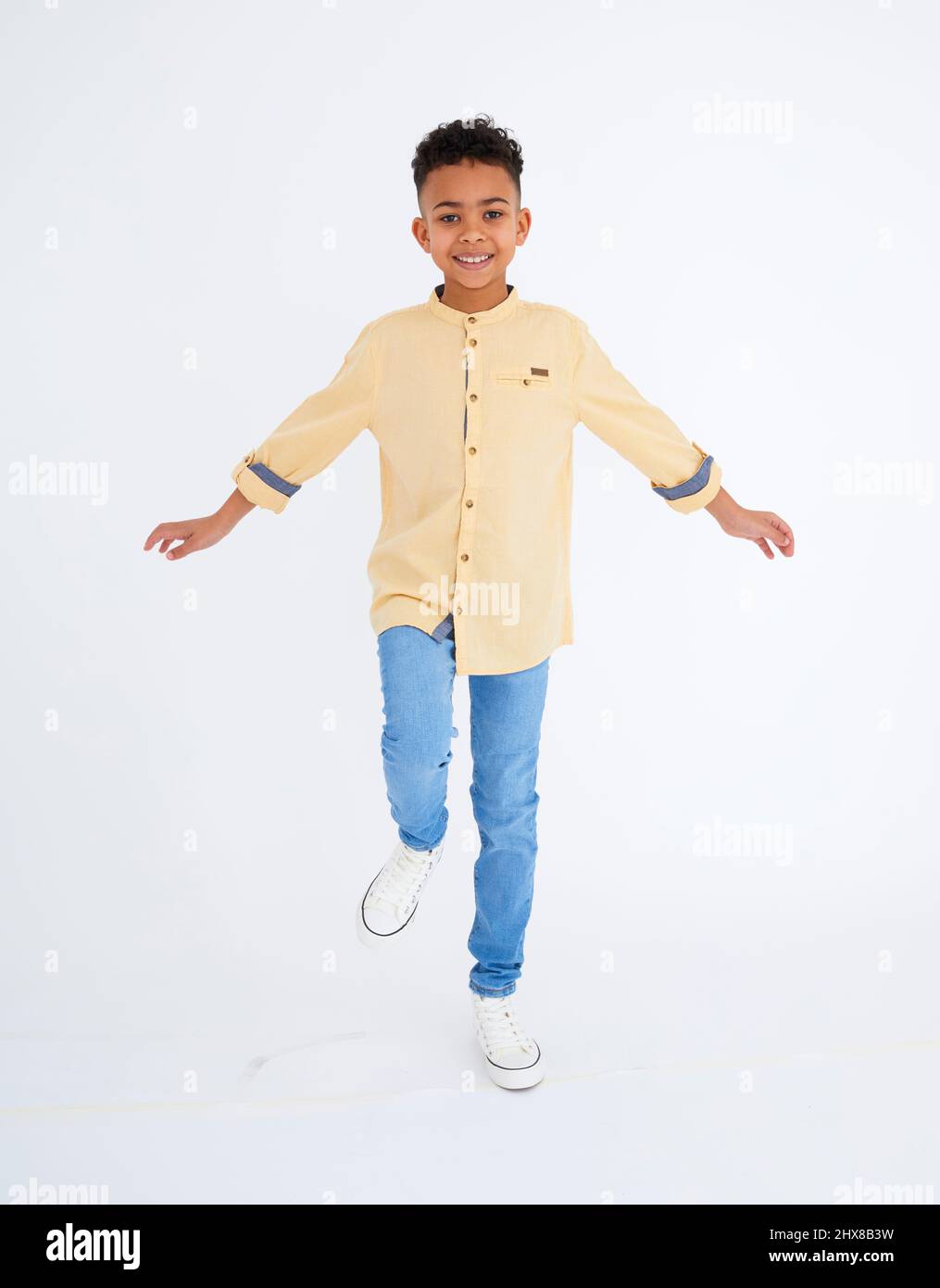 Boy in Steady Balance Pose Stock Photo - Alamy