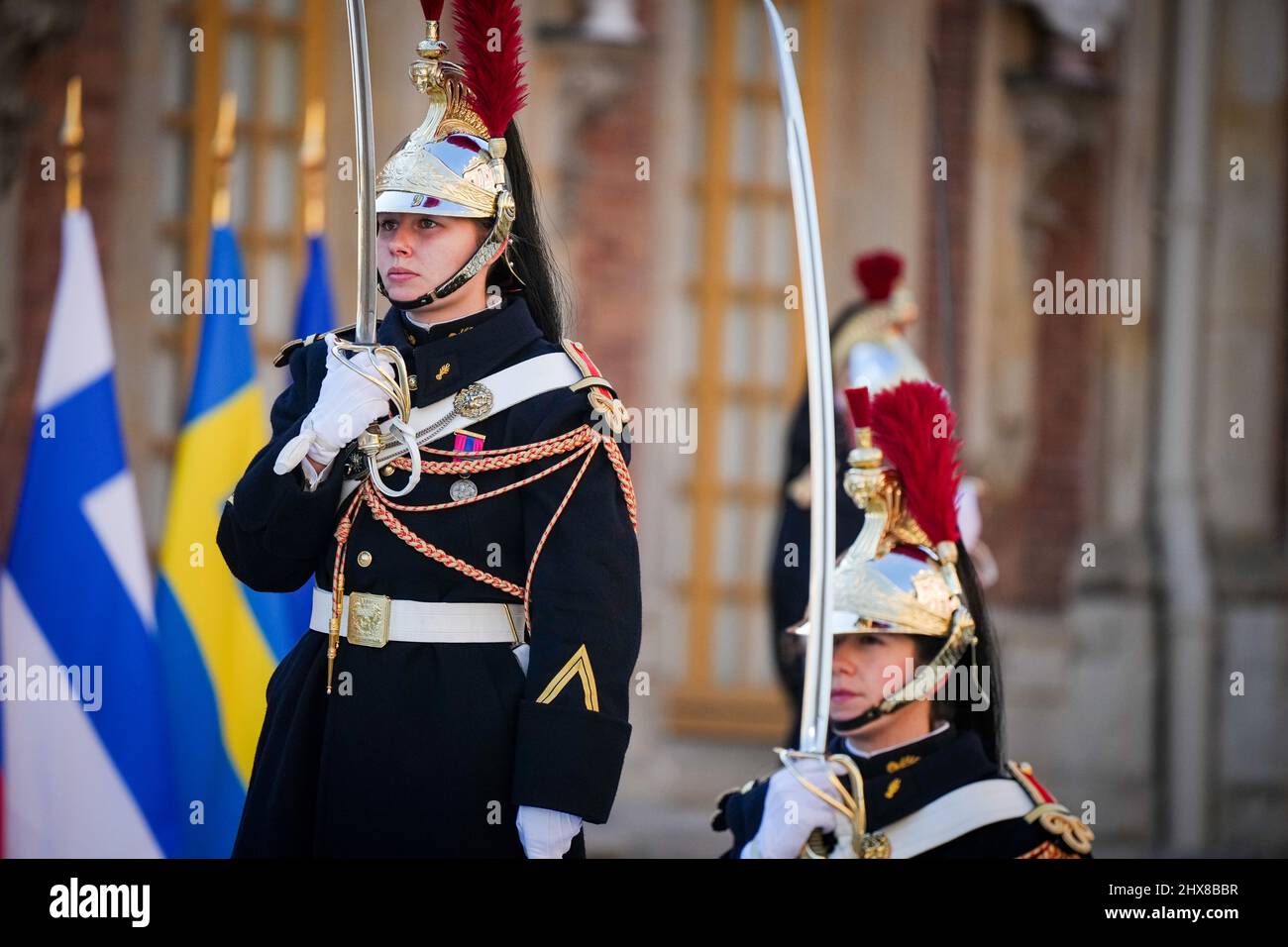 Versailles, France. 10th Mar, 2022. The French honor guard arrives at ...