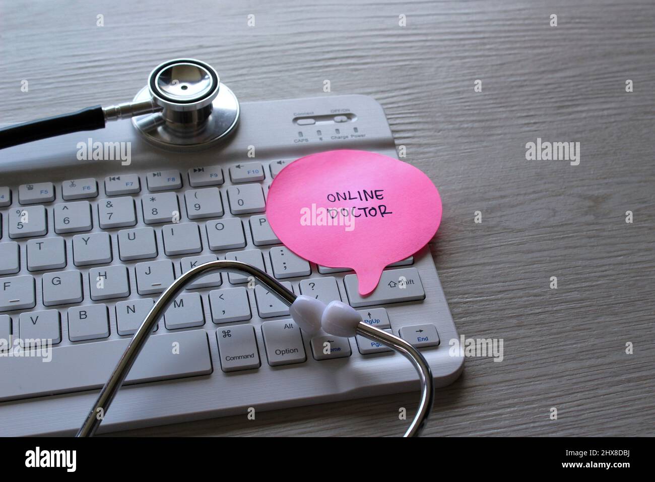 Medical and technology concept. Stethoscope, keyboard and speech bubble ...