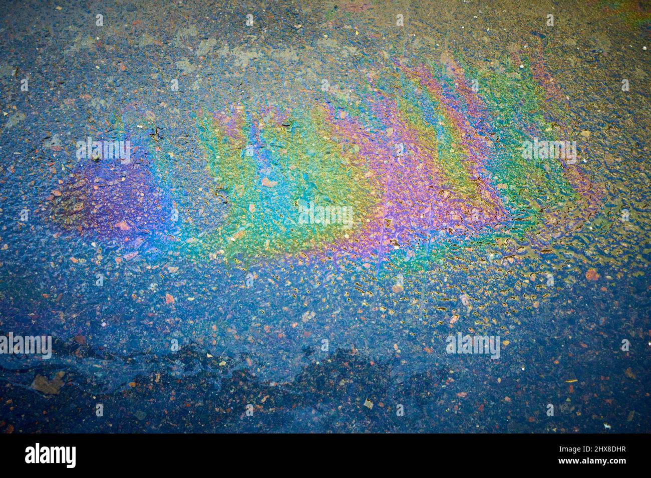 Oil rainbow in puddle hi-res stock photography and images - Alamy