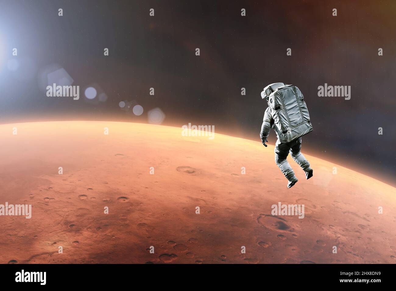 Cosmonaut floating in outer space close to Mars planet. Elements of ...