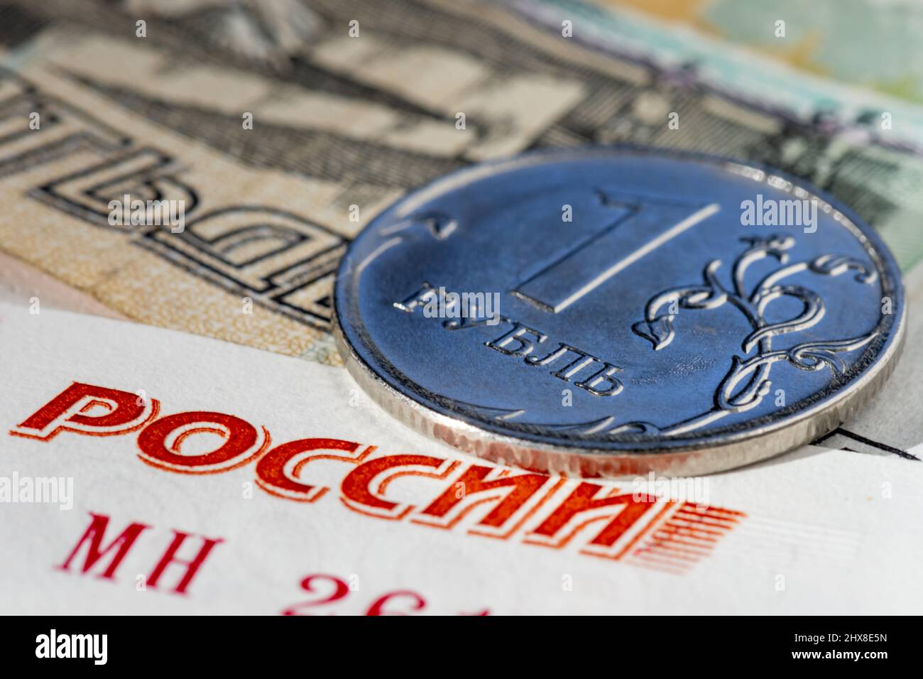 Cash of the Russian Federation. 1 ruble coin ("ruble" written in ...