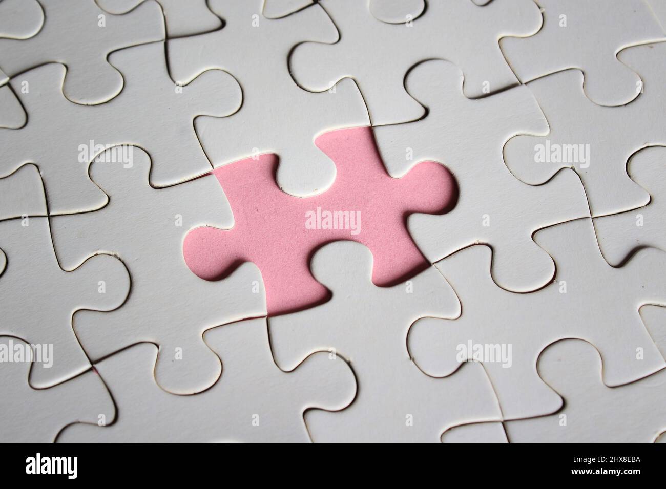 Image of white jigsaw puzzle with missing pieces. Incomplete, solution ...