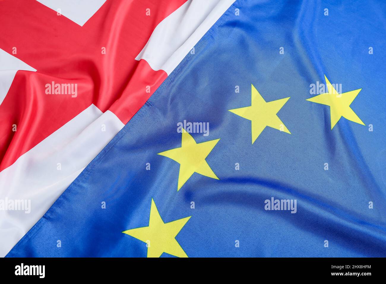 Flags of European Union and England as background, closeup Stock Photo ...