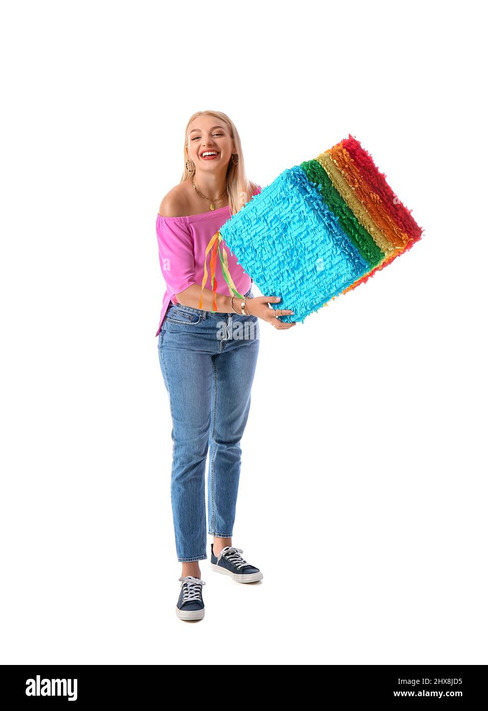 Happy young woman with Mexican pinata on white background Stock Photo ...