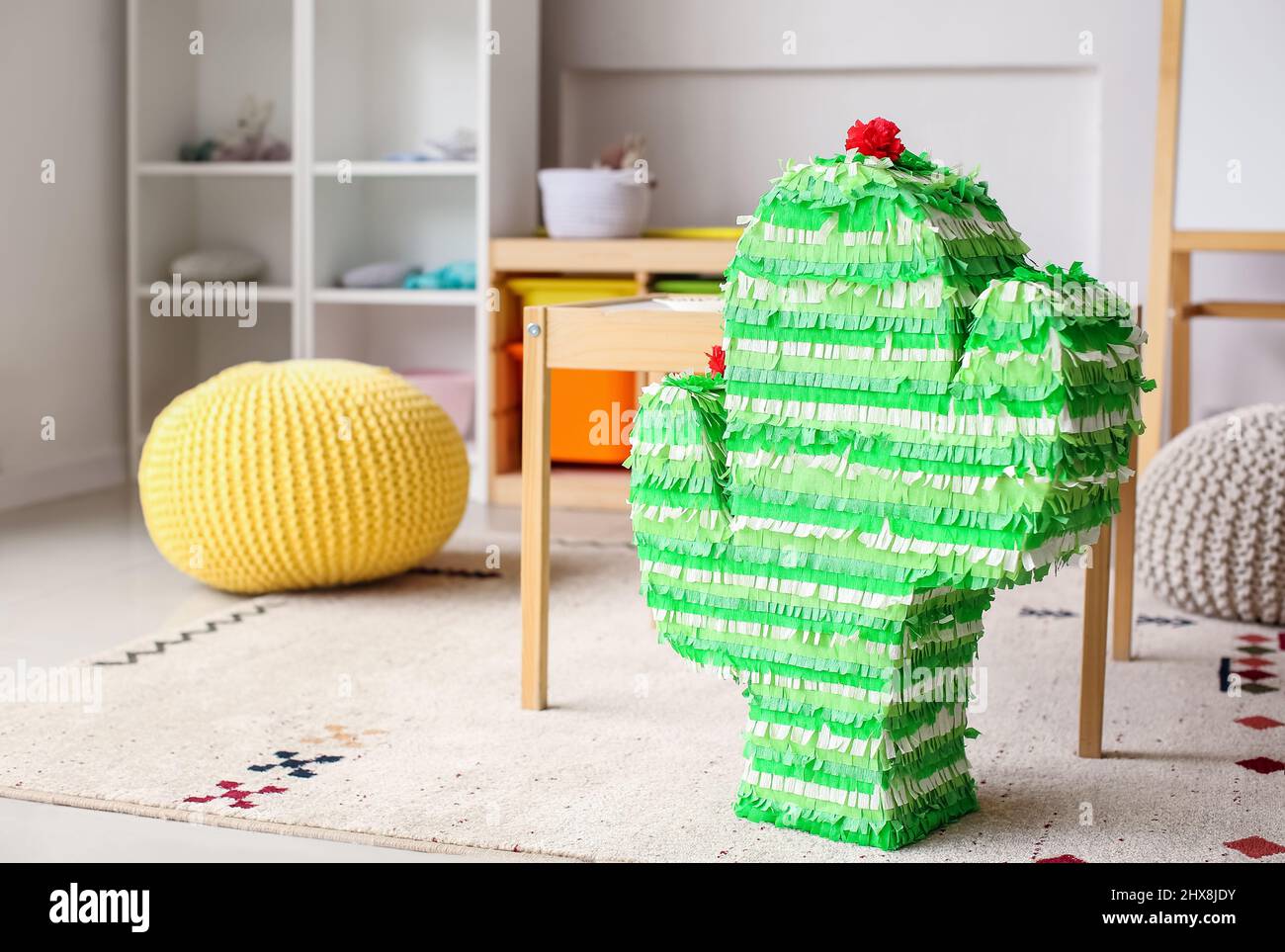 Mexican pinata in light children's room Stock Photo - Alamy