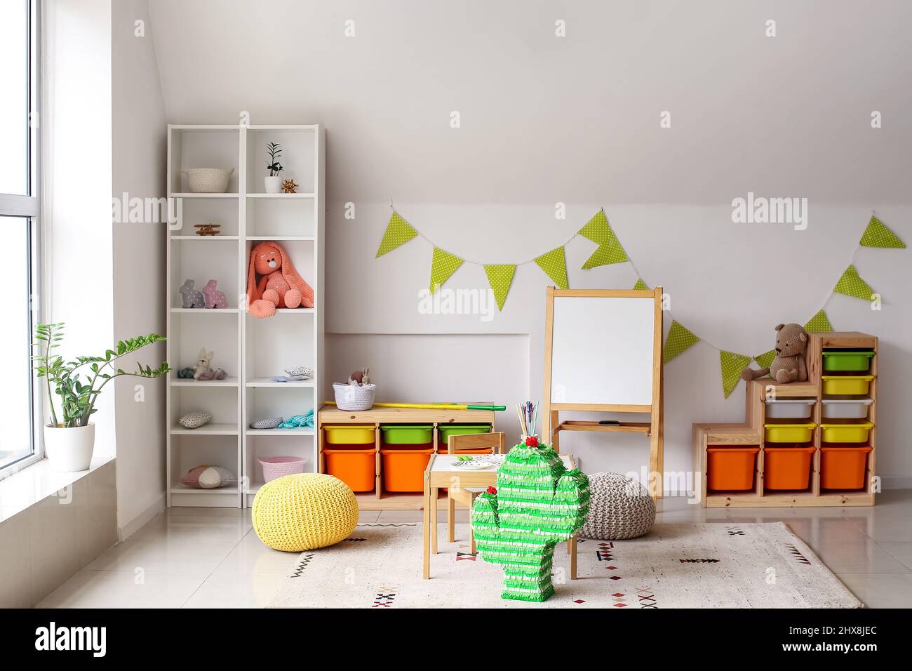 Interior of children's room with Mexican pinata Stock Photo - Alamy