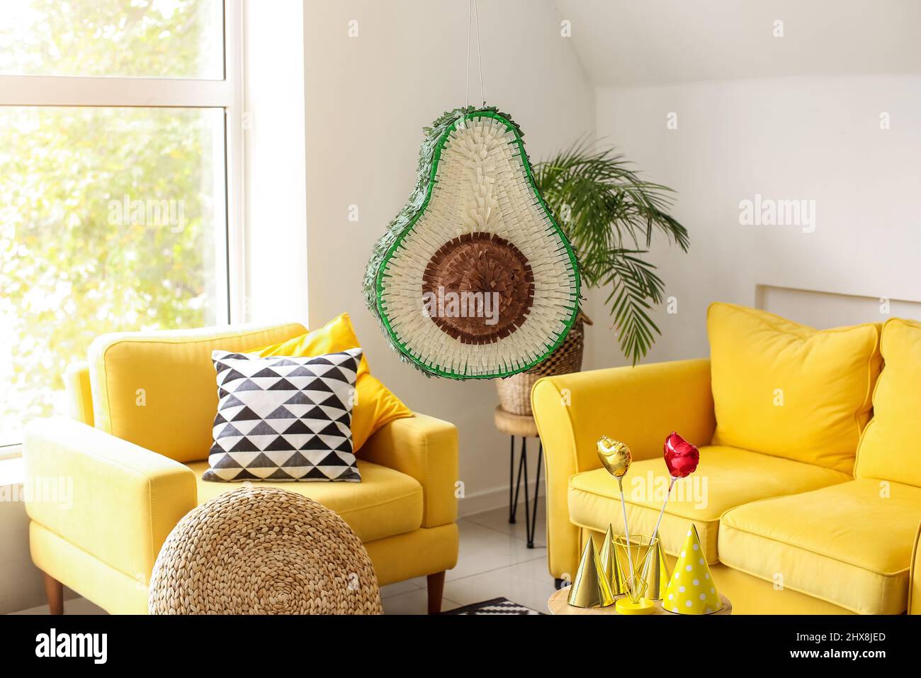 Mexican pinata hanging in stylish living room Stock Photo - Alamy