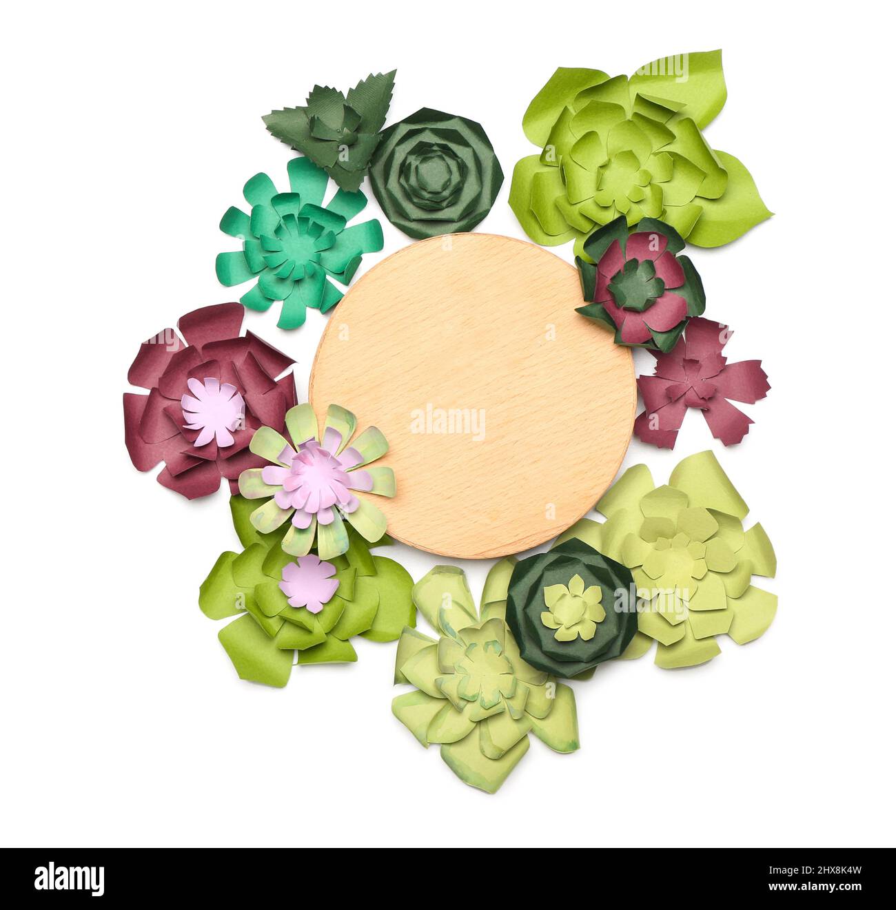 Beautiful handmade paper flowers with blank paper sheet on white ...