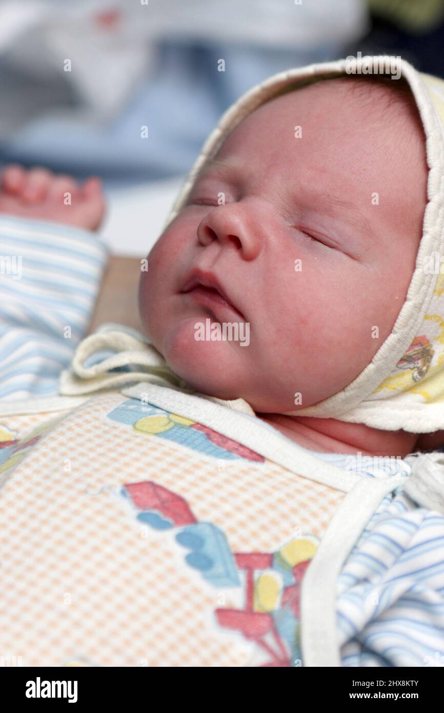 The sleeping caucasian baby at the home Stock Photo - Alamy