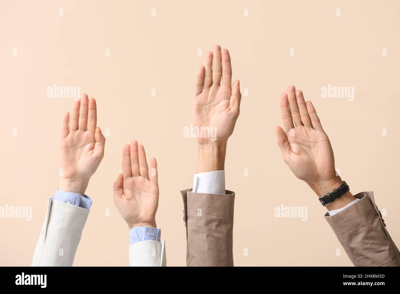 Business workers showing stop gesture on beige background Stock Photo ...