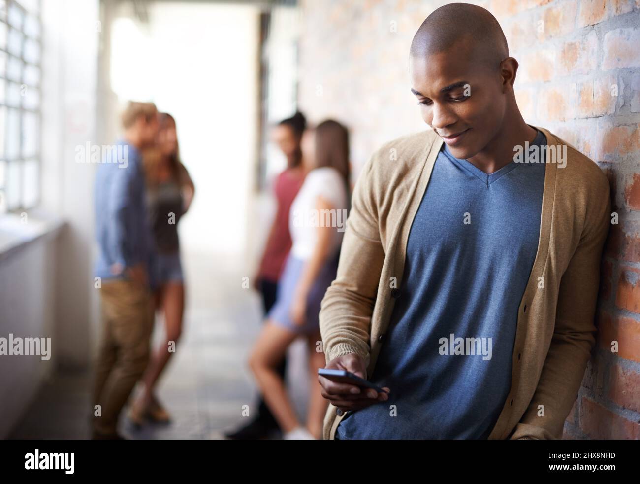Diverse people holding text university hi-res stock photography and ...