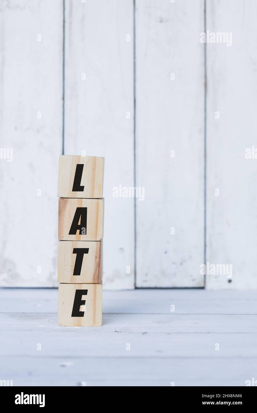 late word or concept on wooden blocks, white wood background Stock ...