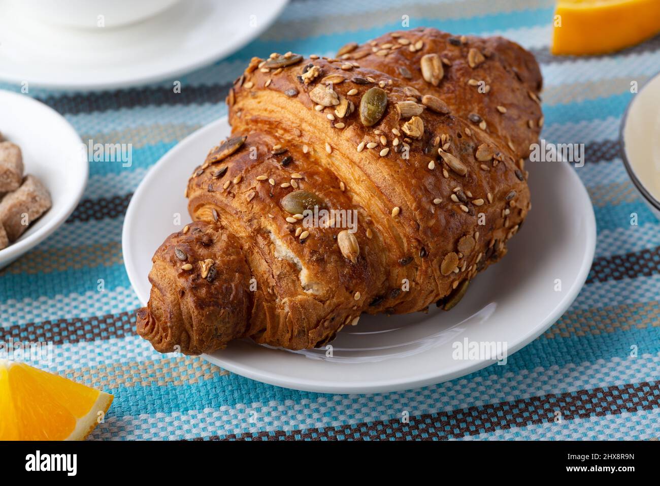 Fresh croissant with seeds ready for breakfast Stock Photo - Alamy
