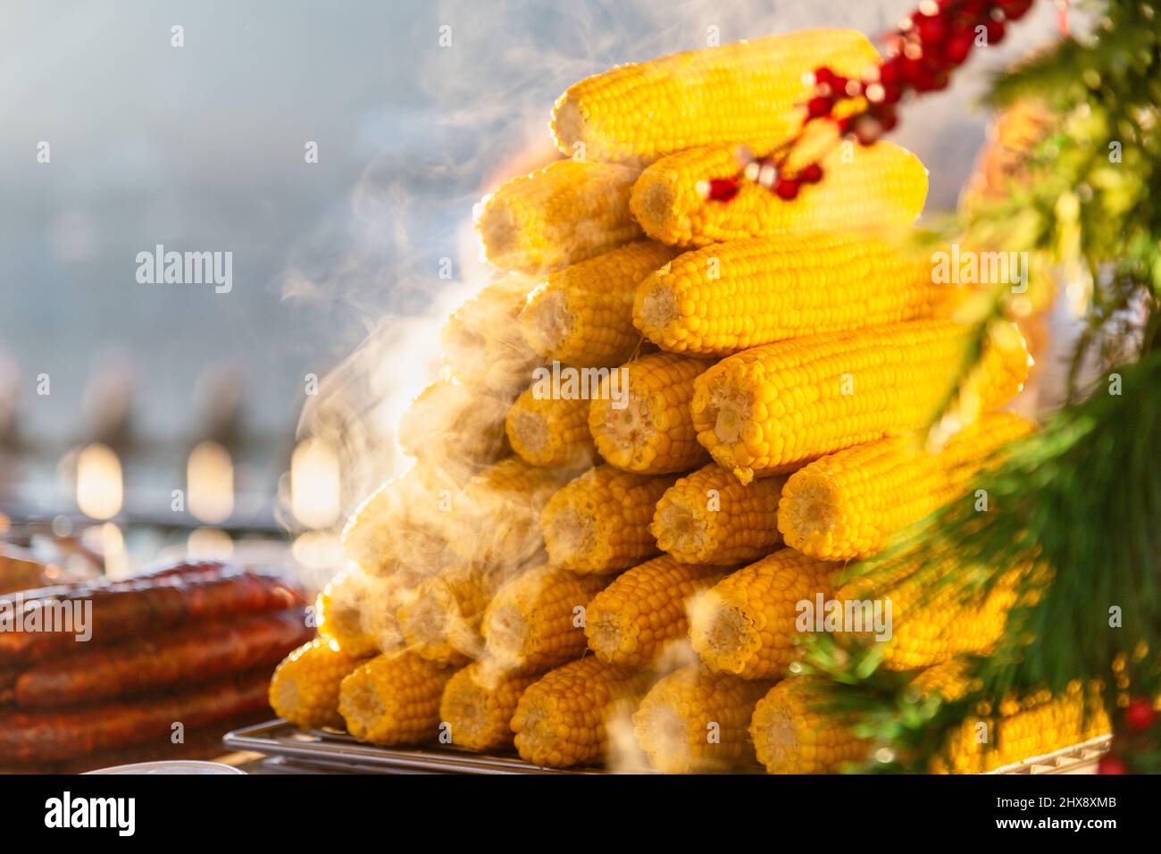 Cooked corn offered at a street market Stock Photo - Alamy