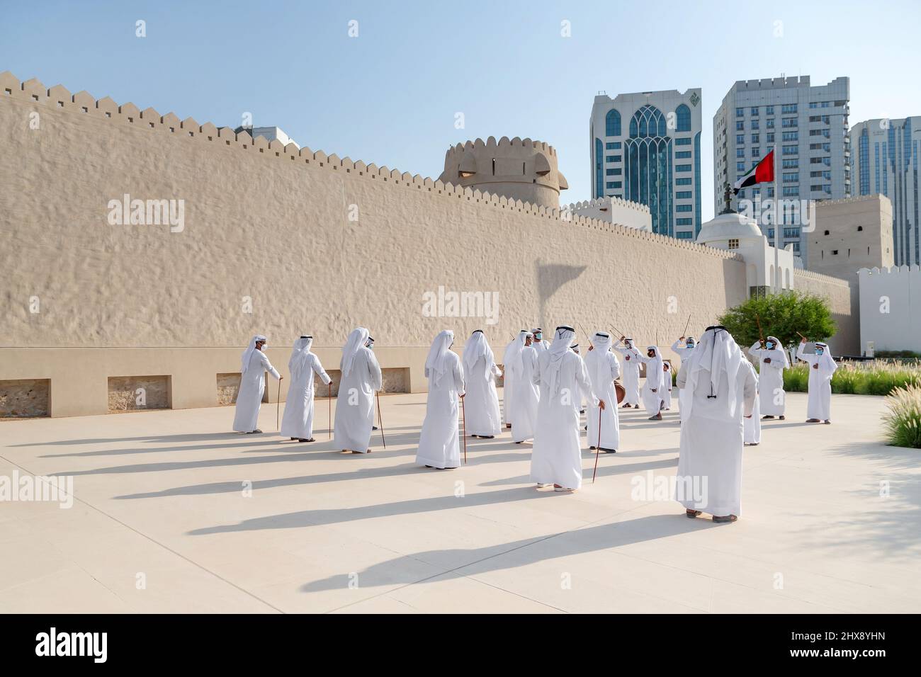ABU DHABI, UAE - MAY 14, 2021: Traditional Emirati male Al Ayalah dance ...