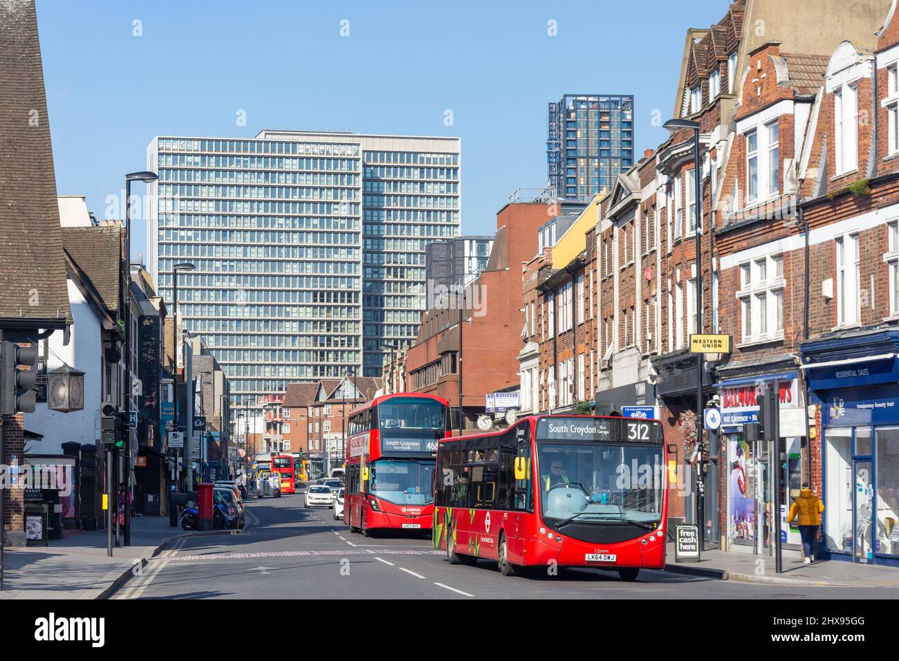 High rise building double decker bus buses red traffic shops sho hi-res ...