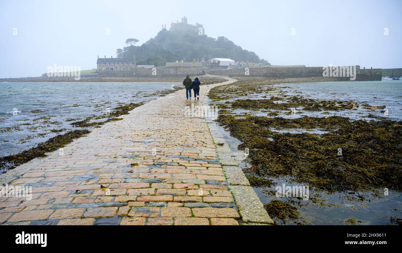 St Michael's Mount at low tide on a wet rainy morning Stock Photo - Alamy