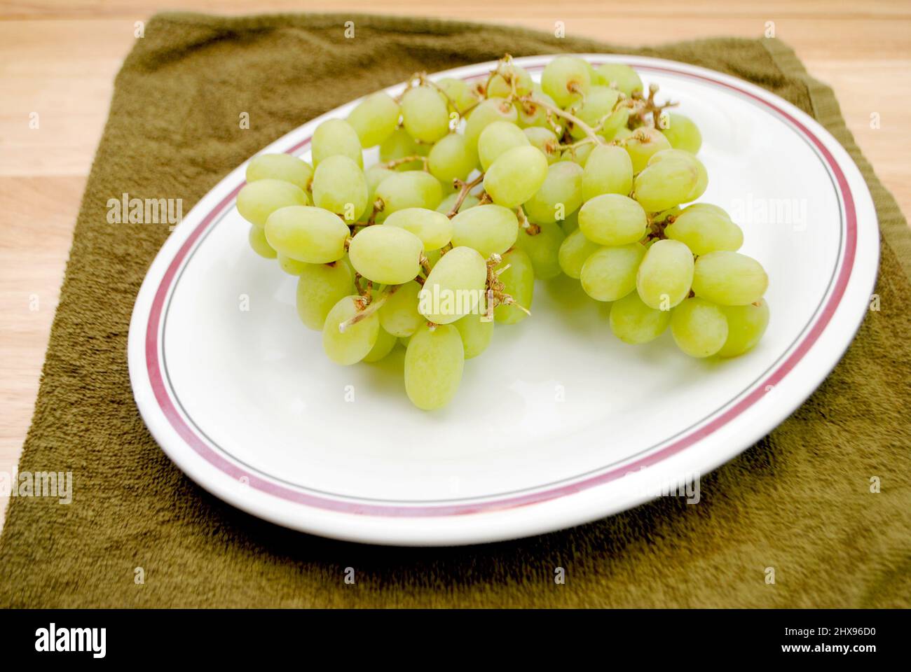 A Snack of Green Grapes on a White Background Stock Photo - Alamy
