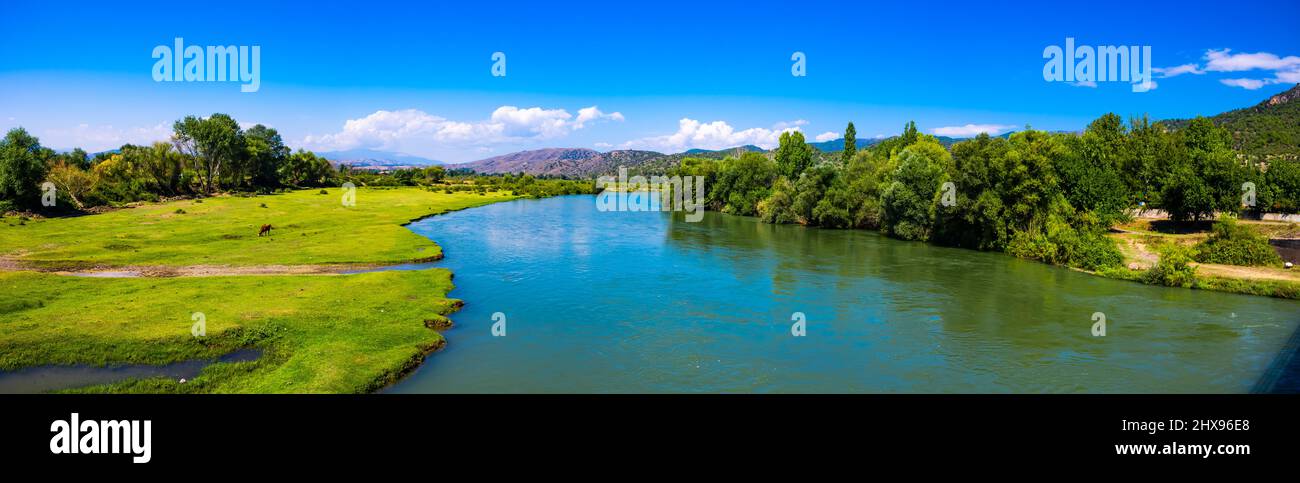 River panorama. Meadow and forest near the river in panoramic view ...
