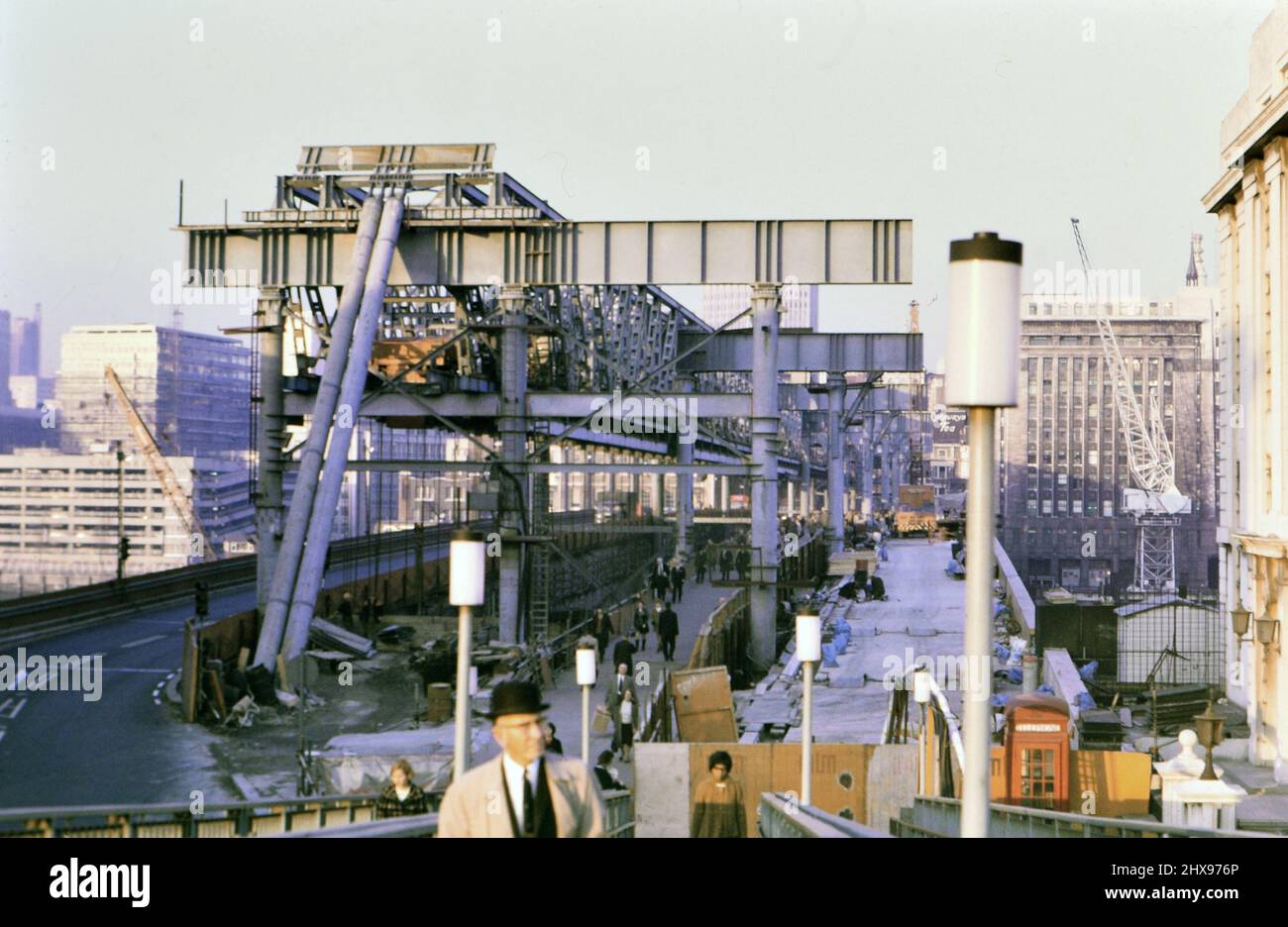 1970s London: Pedestrian traffic on London Bridge during construction ...
