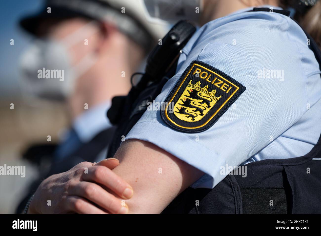 Stuttgart, Germany. 25th Feb, 2022. Police officers talking to a ...