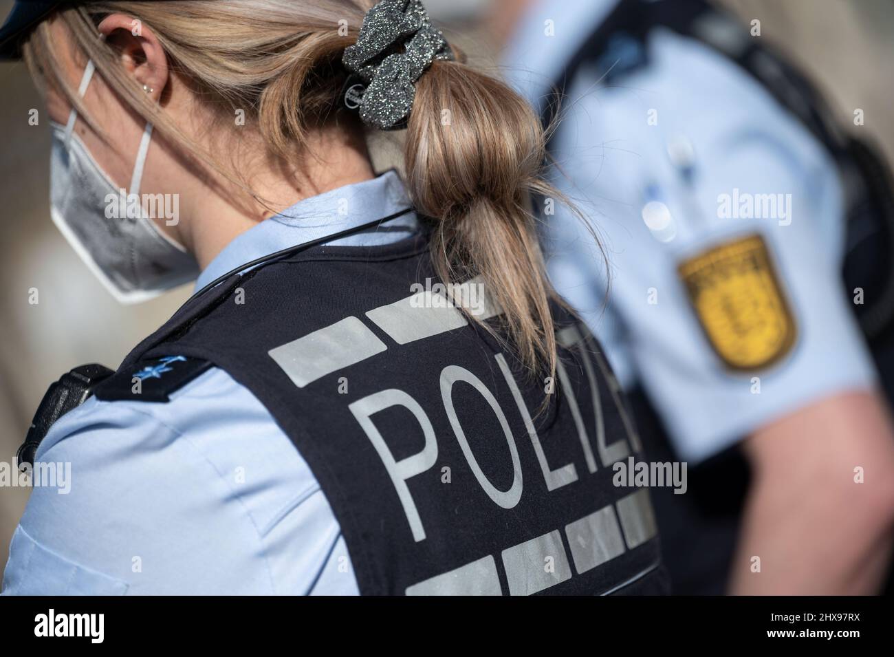 Stuttgart, Germany. 25th Feb, 2022. Police officers talking to a ...