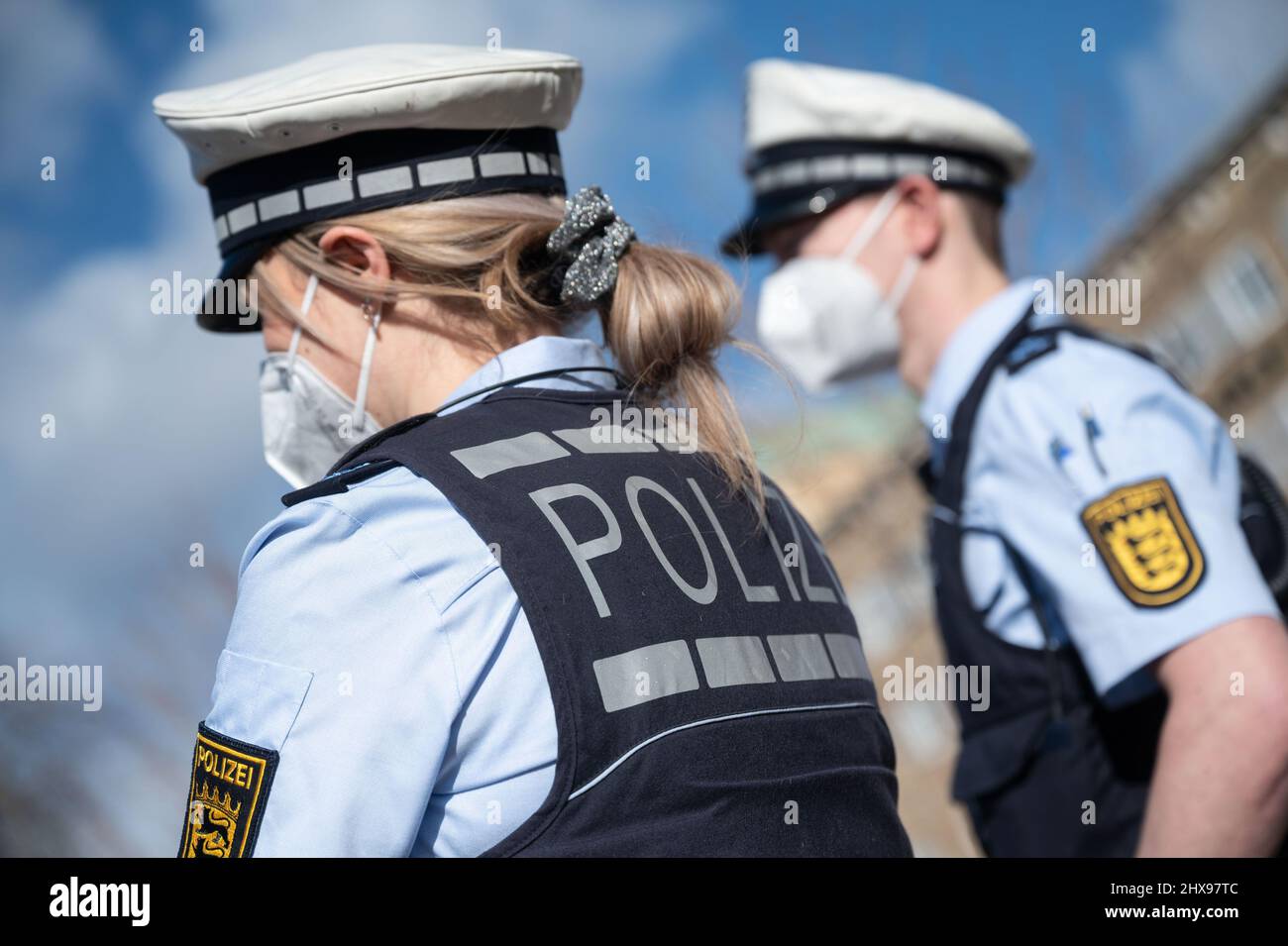Stuttgart, Germany. 25th Feb, 2022. Police officers talking to a ...